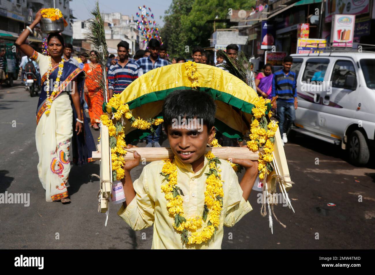 An young Indian Tamil Hindu devotee participates in a religious ...