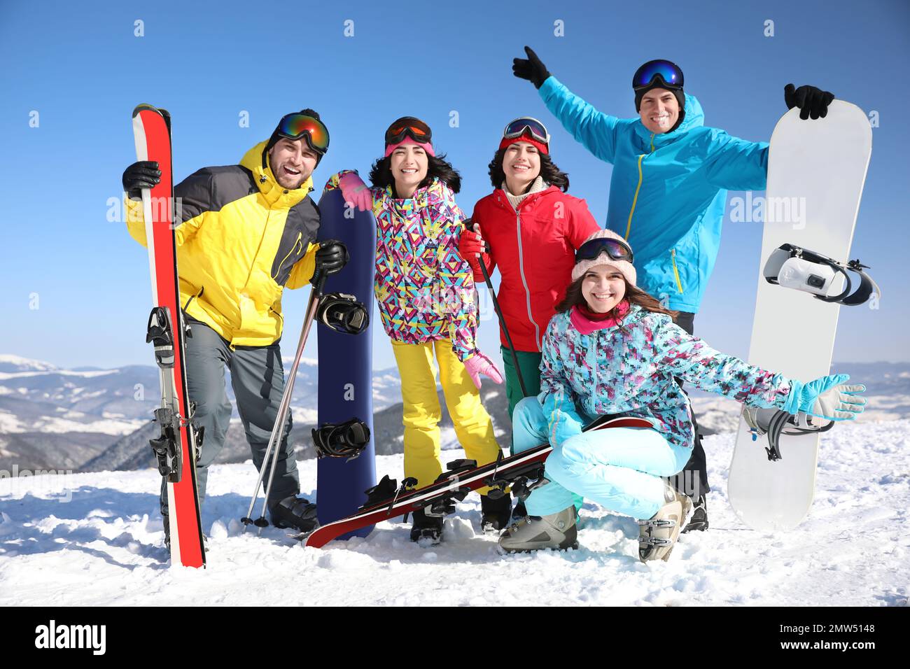 Group of friends with equipment at ski resort. Winter vacation Stock ...