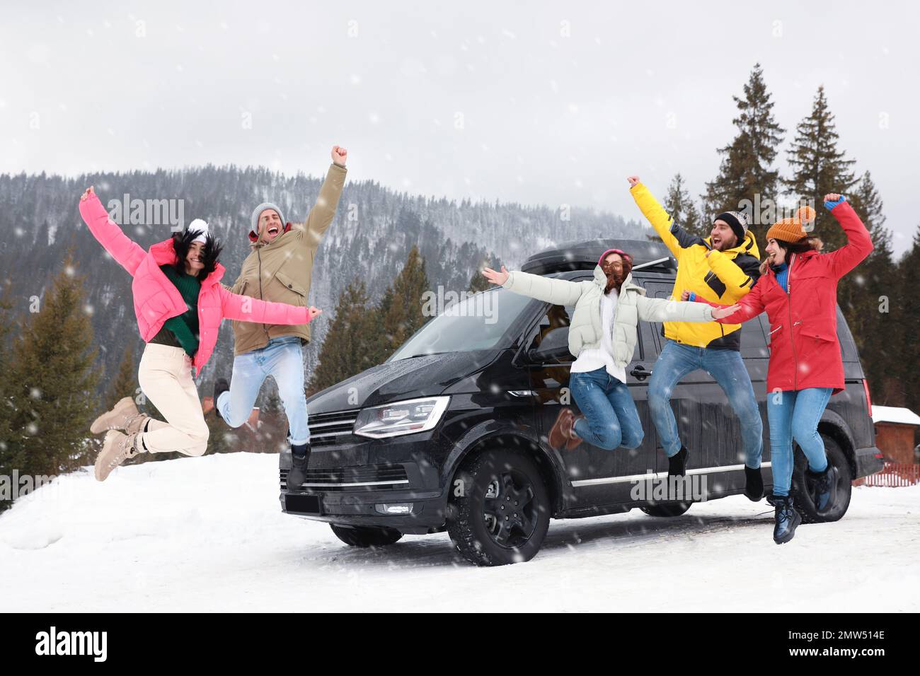 Happy group friends jumping full hi-res stock photography and images ...