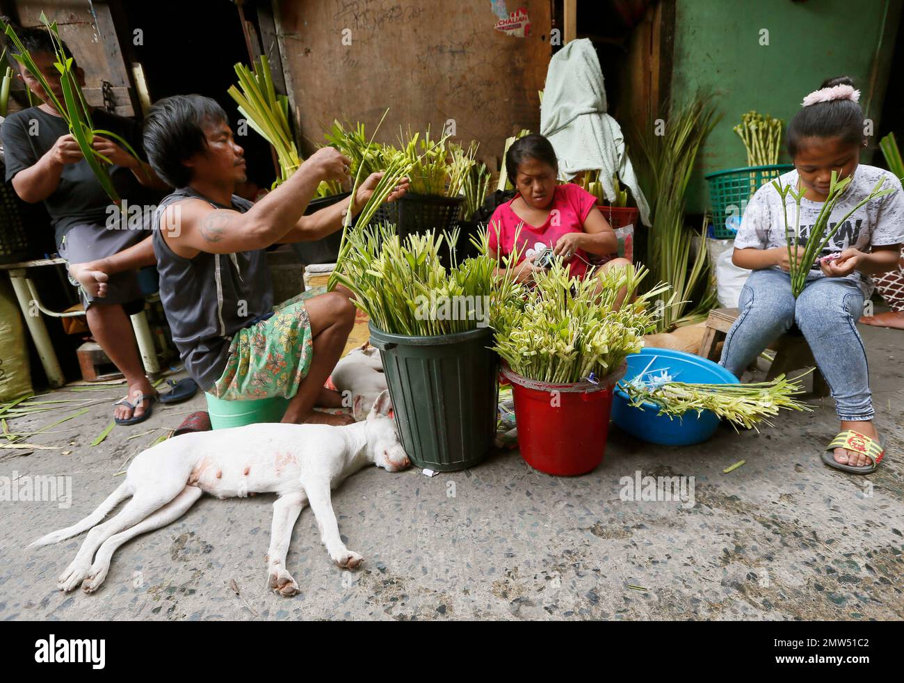 Enterprising residents make different designs out of palm fronds as the ...
