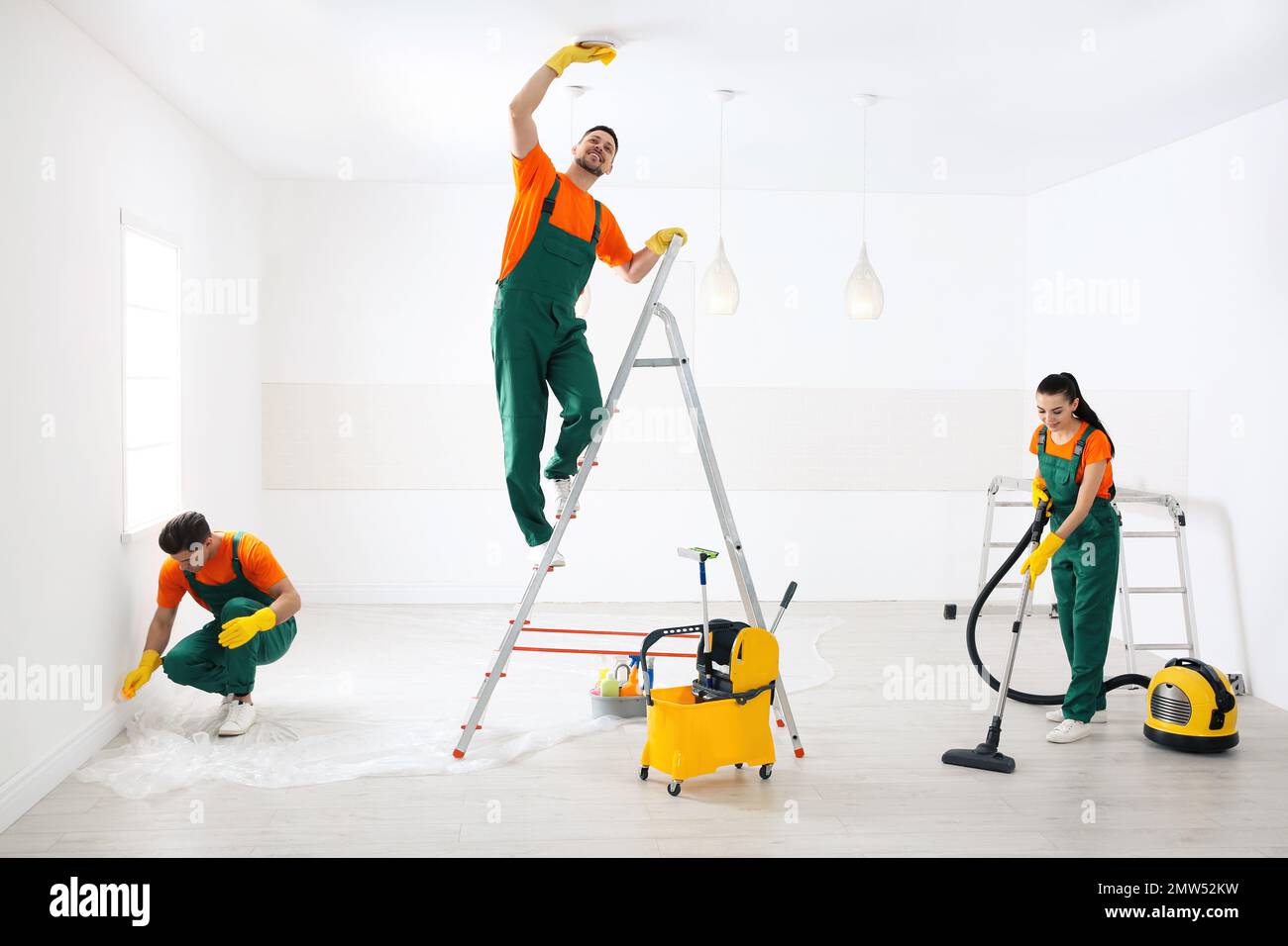 Office cleaning team floor hi-res stock photography and images - Alamy