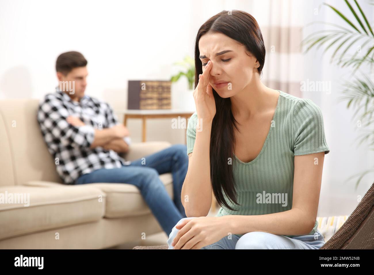 Woman crying after quarrel with her boyfriend at home. Relationship ...