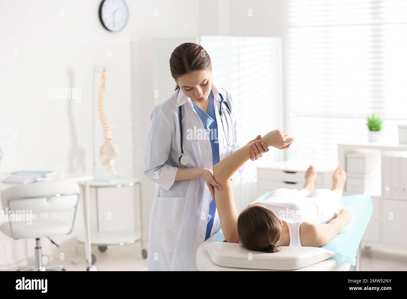 Teen doctor examining hi-res stock photography and images - Alamy
