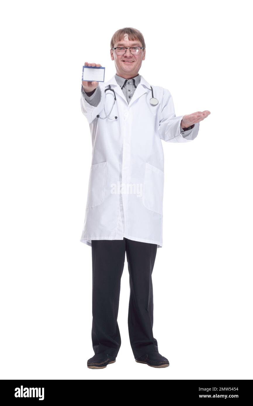 in full growth. smiling doctor showing his visiting card. isolated on ...