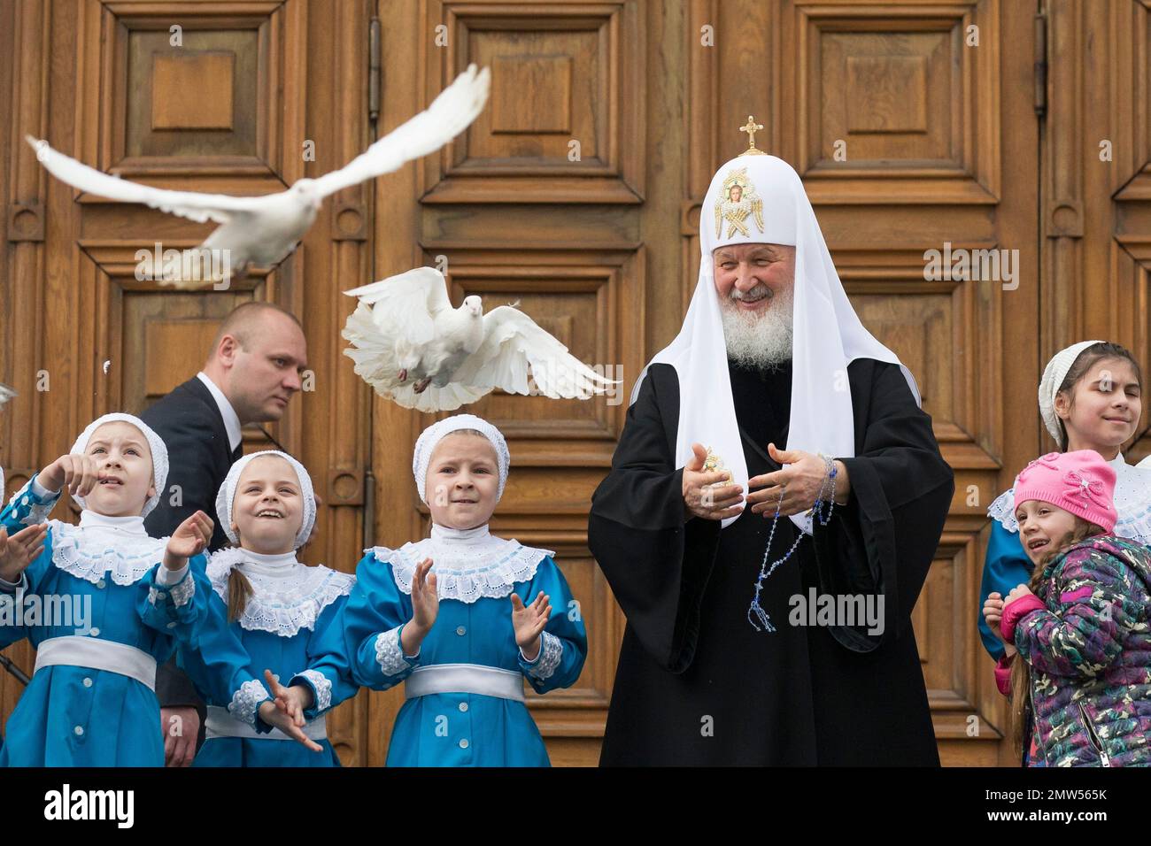 Russian Orthodox Church Patriarch Kirill, center, releases birds at ...