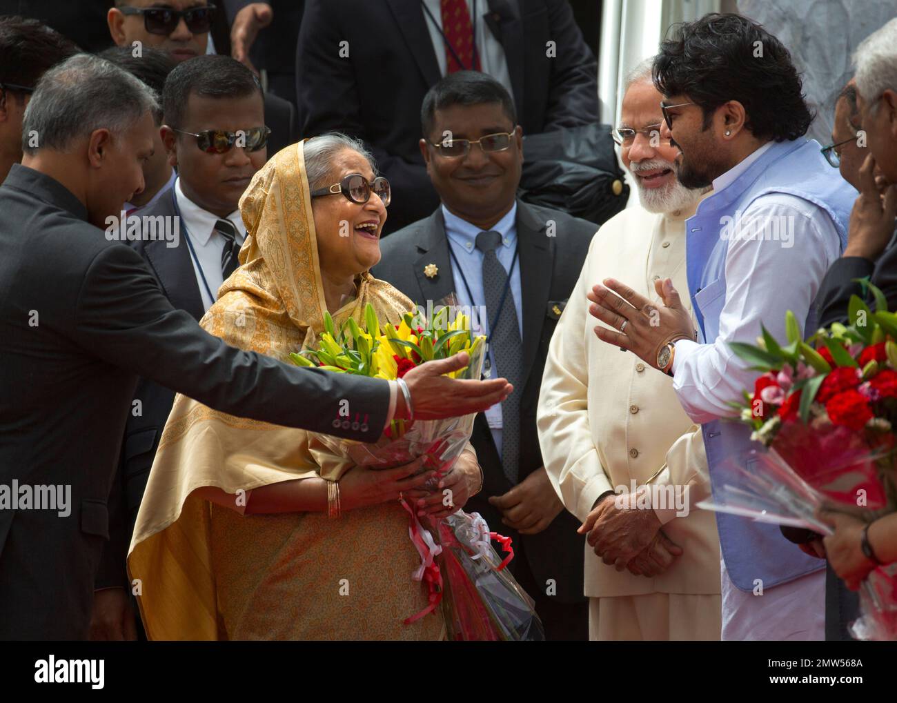 Indian protocol officer, left, introduces Indian Junior Minister for ...
