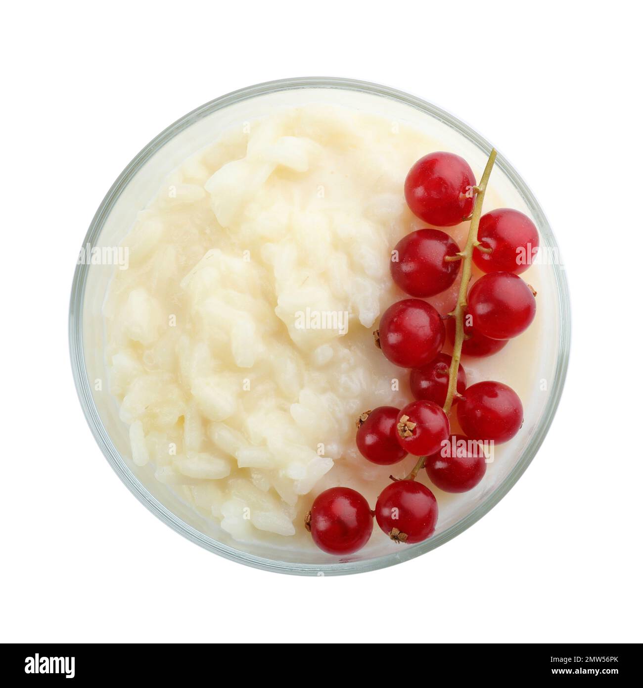 Delicious rice pudding with redcurrant isolated on white, top view ...