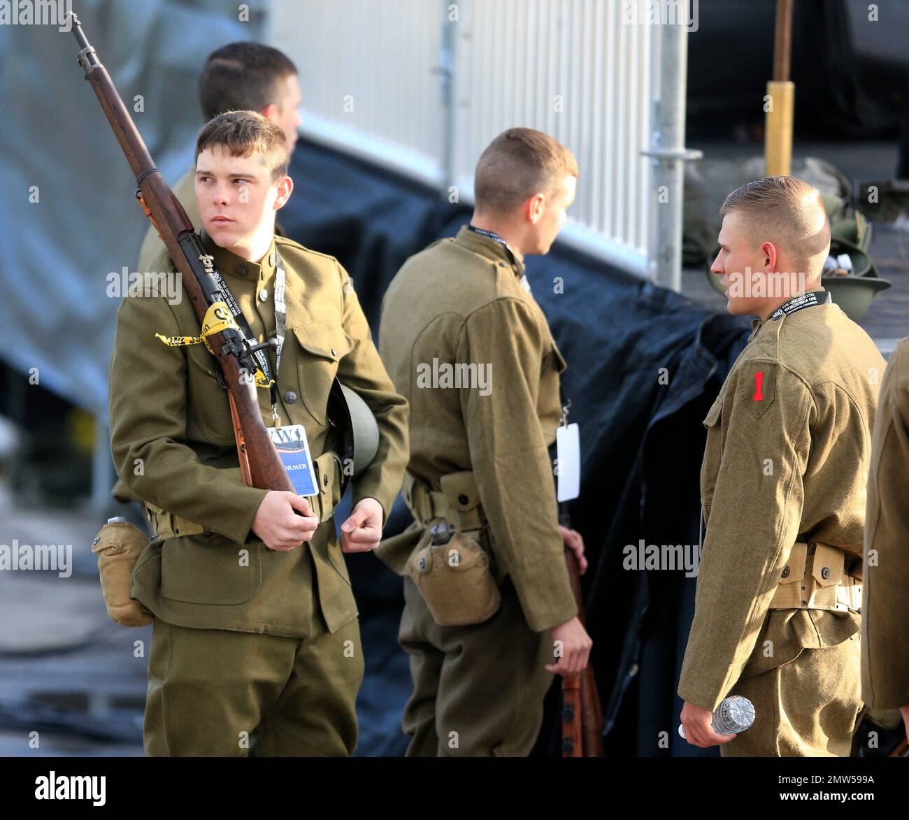 Members of the 1st Infantry Division color guard stand at ease while ...