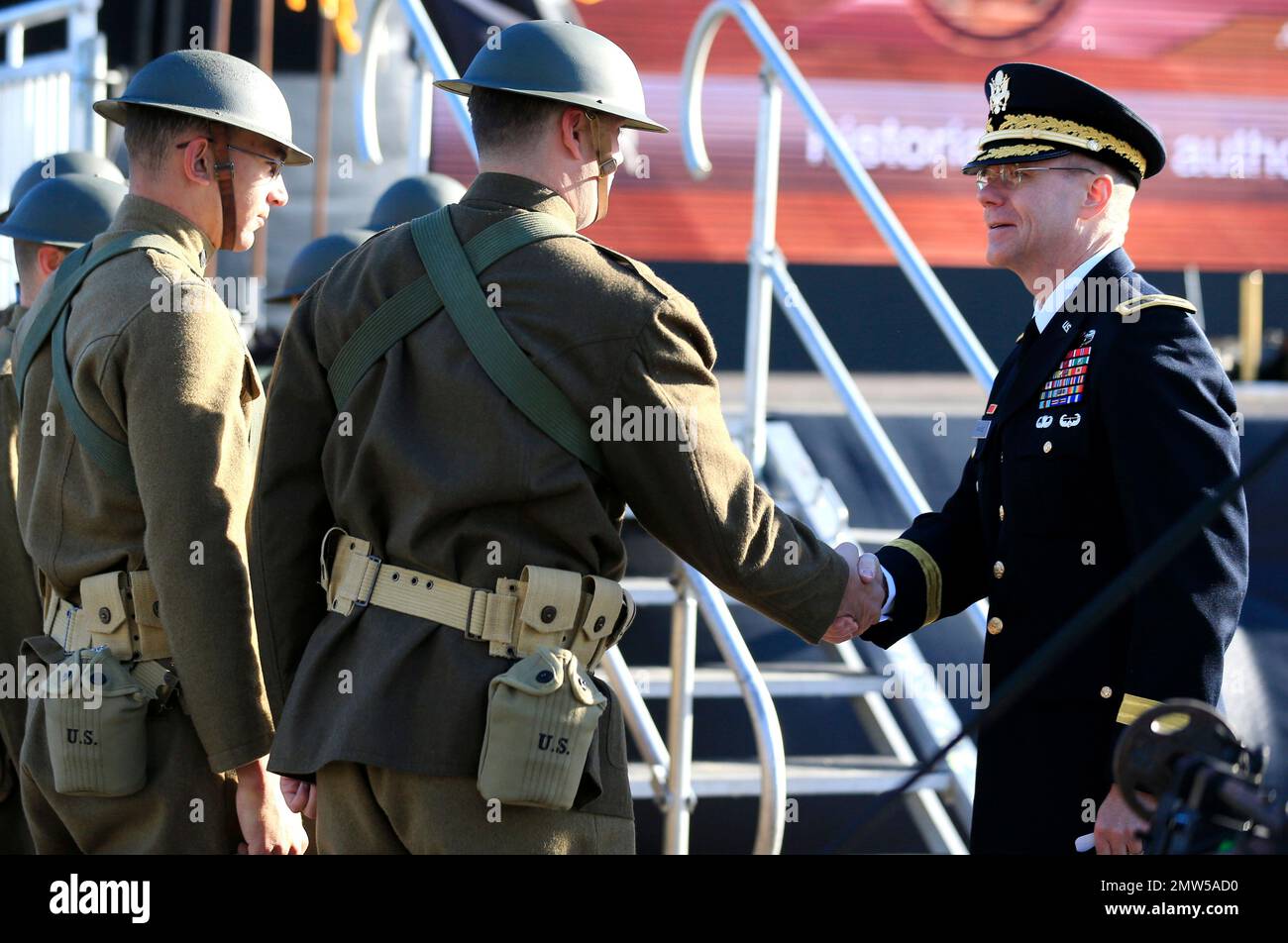 Brigadier General Chris Gentry, right, shakes hands with 1st Infantry ...