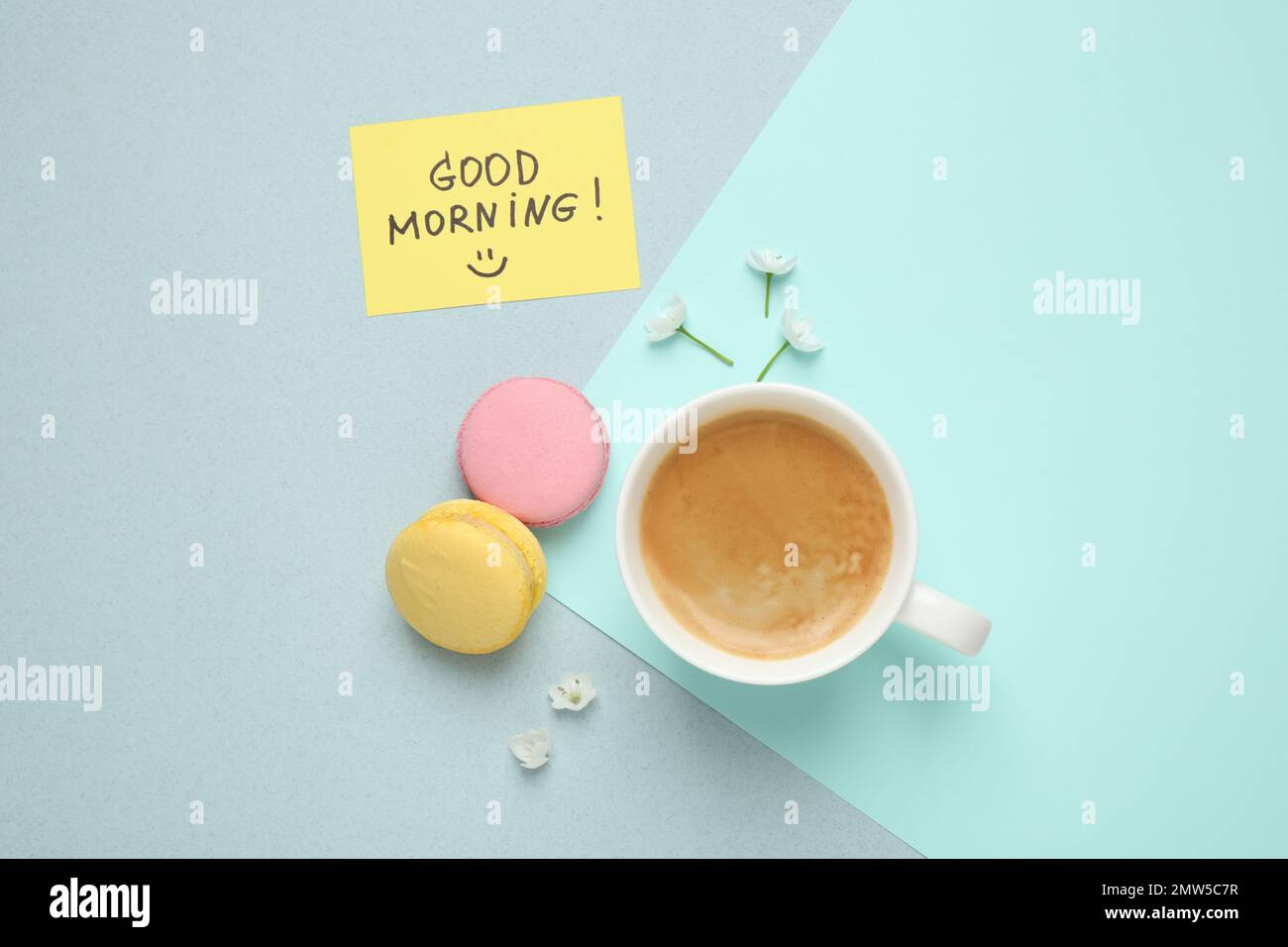 Delicious coffee, macarons, flowers and card with GOOD MORNING wish on ...