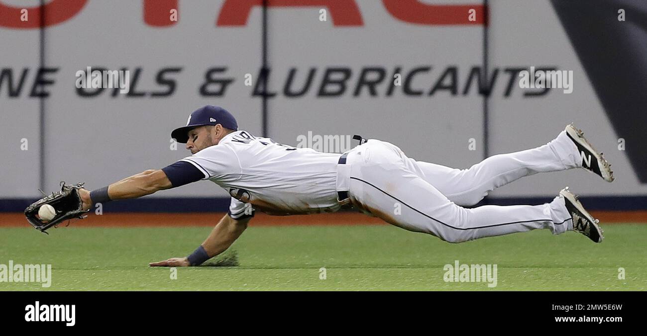 Tampa Bay Rays center fielder Kevin Kiermaier dives but can't hang onto ...