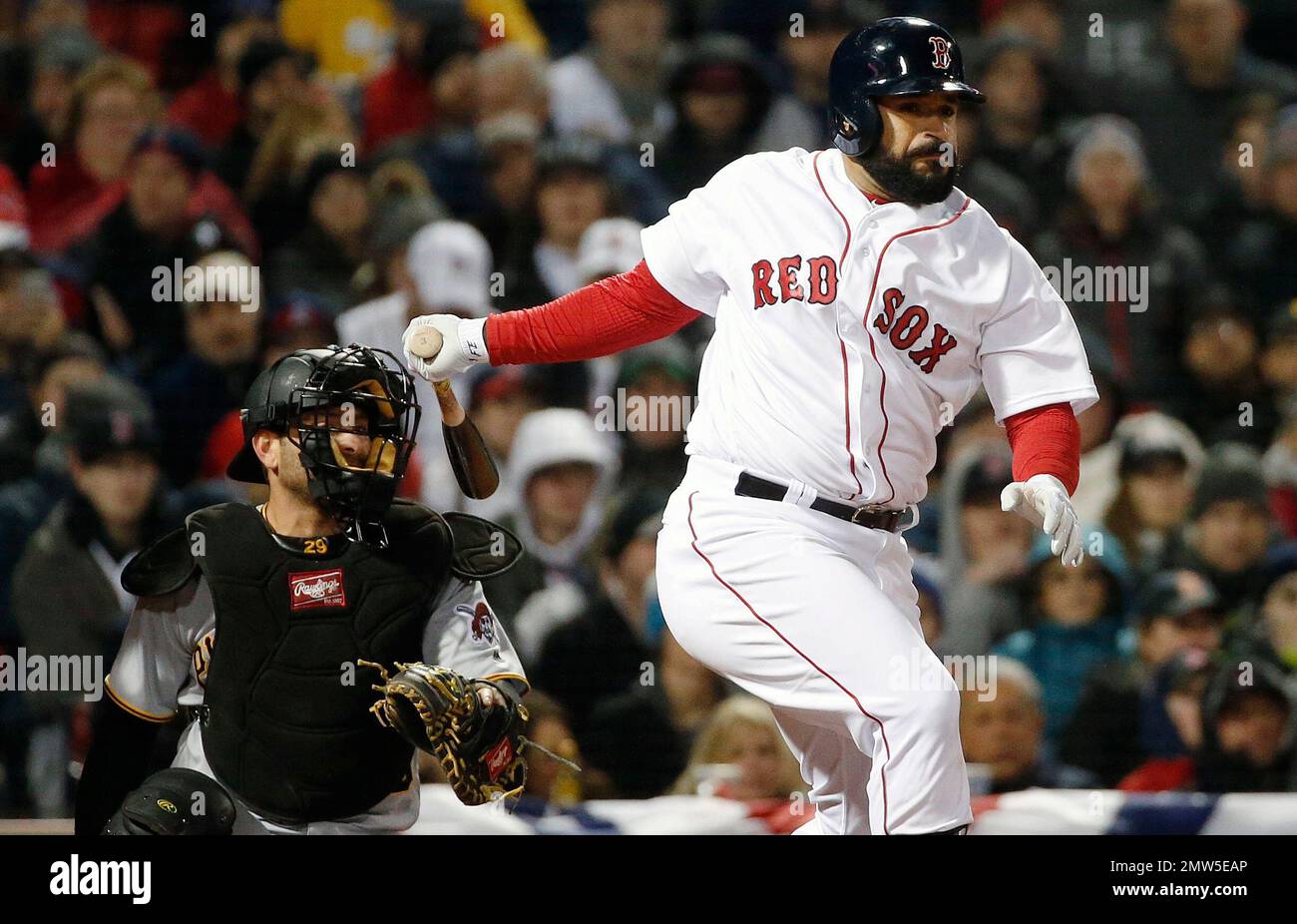 Boston Red Sox's Sandy Leon follows through on a double in front of ...