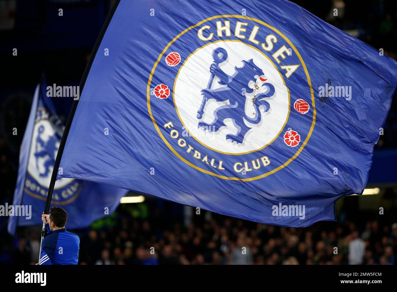 Flags of Chelsea FC are waved on the pitch before the English Premier ...