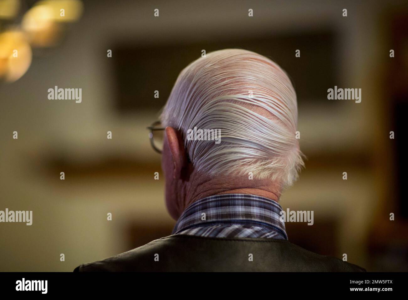 Rancher Jim Chilton shows off a combover hairstyle after removing his ...