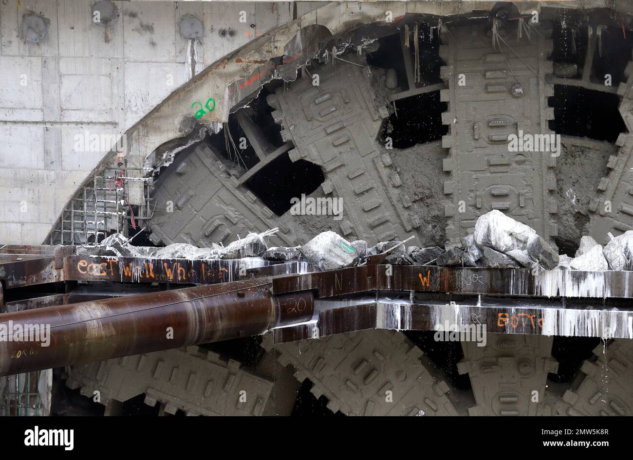 Debris sits atop bracing that had been holding a five-foot wide ...