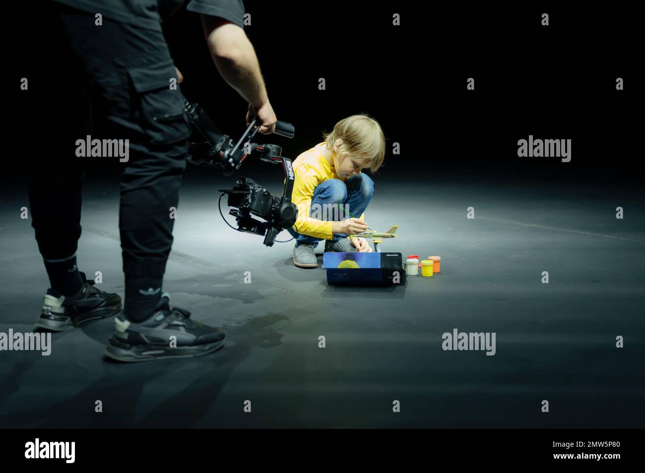 Russia, Moscow 06.15.2022. videographer shoots on video camera, as ...