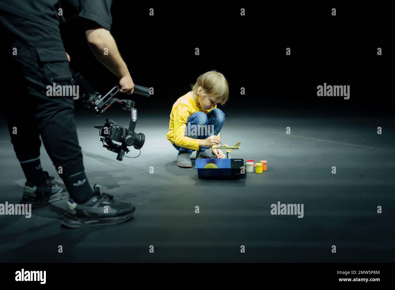 Russia, Moscow 06.15.2022. videographer shoots on video camera, as ...