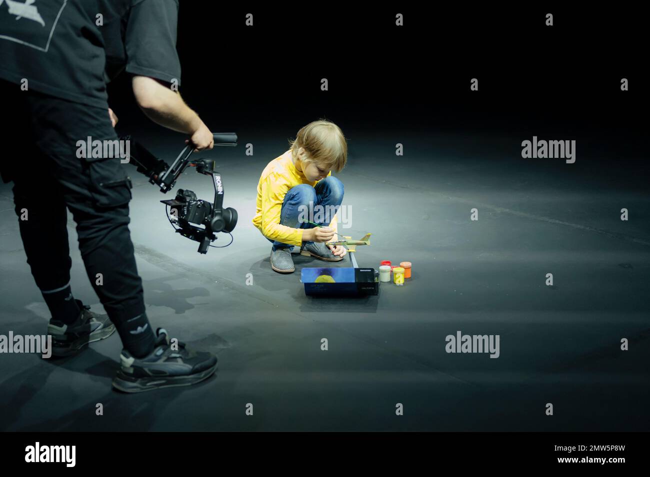 Russia, Moscow 06.15.2022. videographer shoots on video camera, as ...