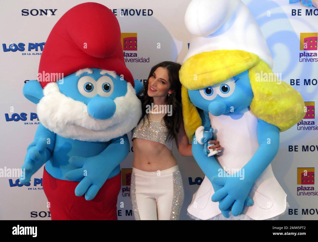 In this April 1, 2017, photo, Mexican singer Paty Cantu, center, poses ...