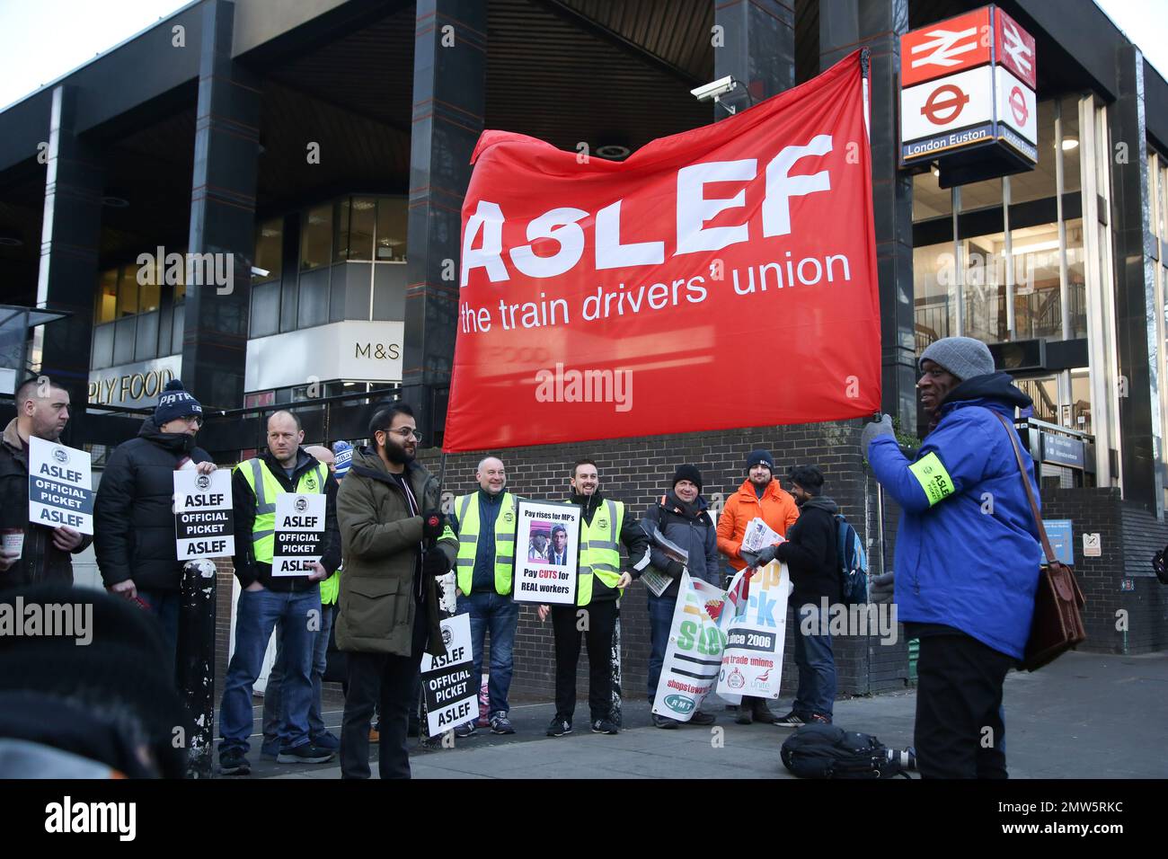 London, UK. 01st Feb, 2023. Union members of Associated Society of Locomotive Engineers and ...