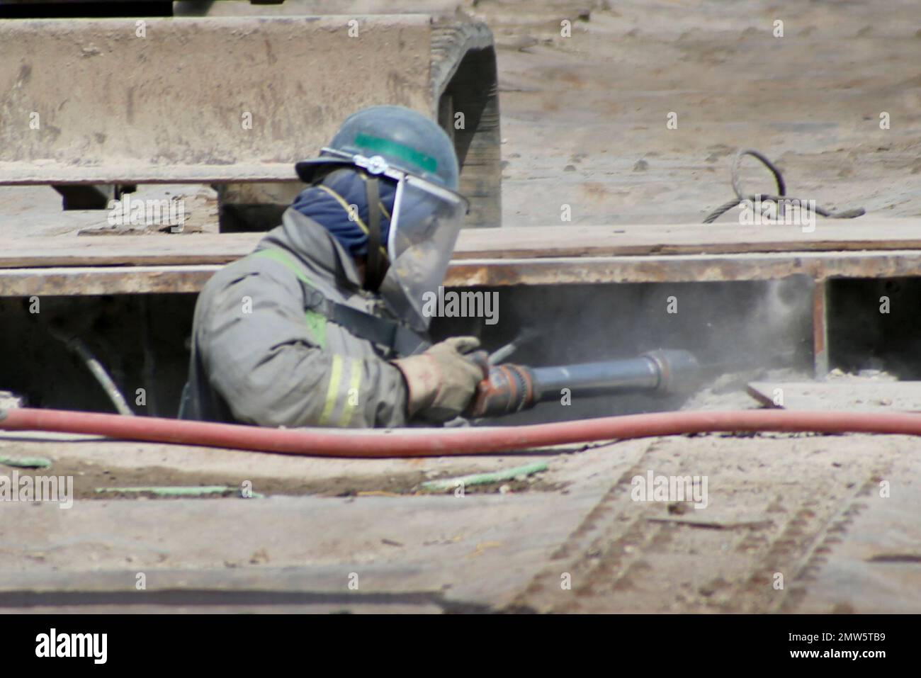 A worker on the Seventh Streeet Bridge, also known as the Andy Warhol ...