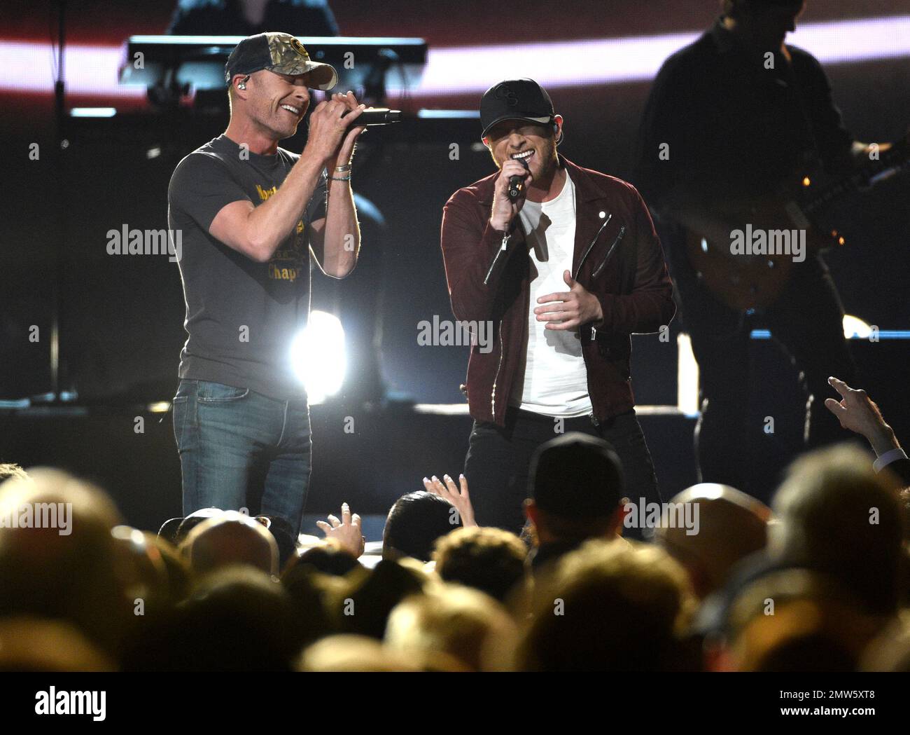 Dierks Bentley, left, and Cole Swindell perform "Flatliner" at the 52nd ...