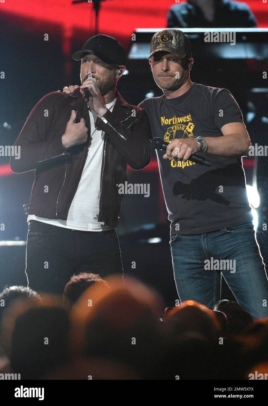 Cole Swindell, left, and Dierks Bentley perform "Flatliner" at the 52nd ...