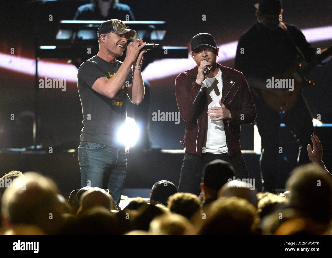 Dierks Bentley, left, and Cole Swindell perform "Flatliner" at the 52nd ...