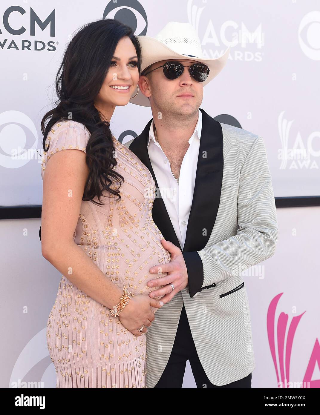 Justin Moore, right, and Kate Moore arrive at the 52nd annual Academy ...
