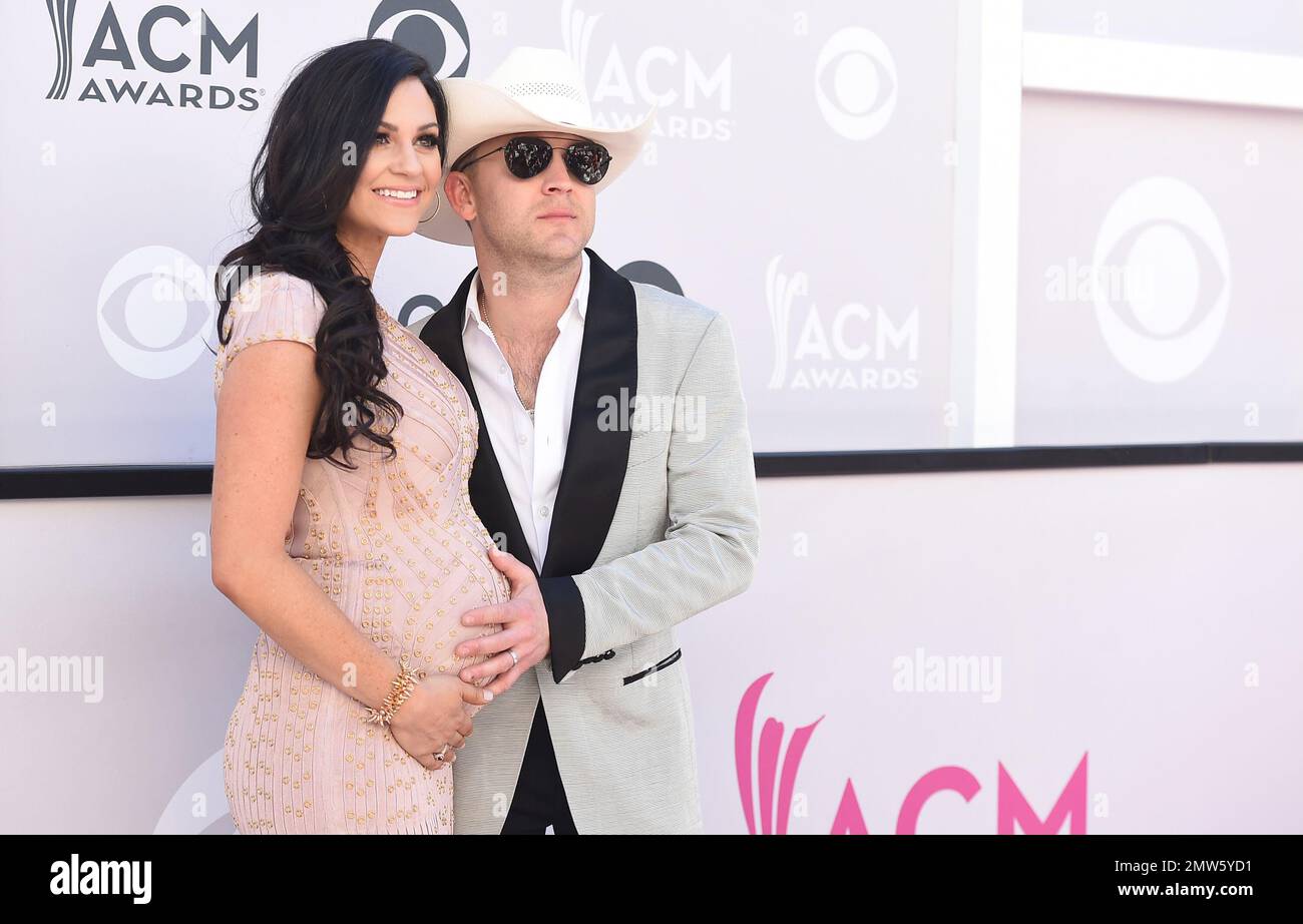 Justin Moore, right, and Kate Moore arrive at the 52nd annual Academy ...