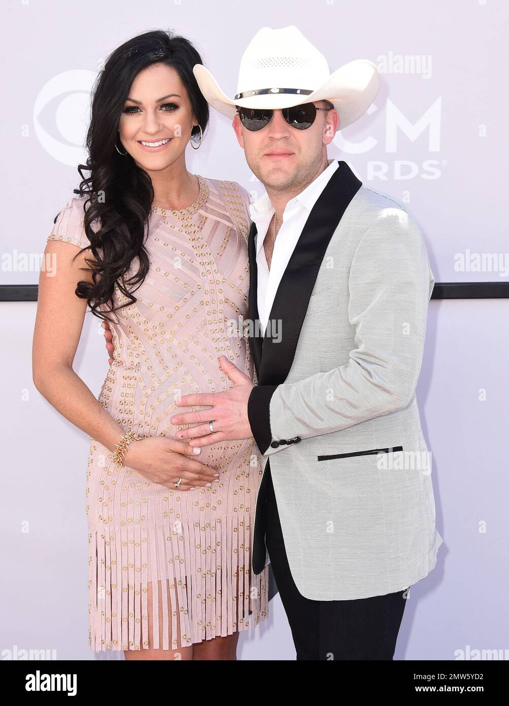 Justin Moore, right, and Kate Moore arrive at the 52nd annual Academy ...