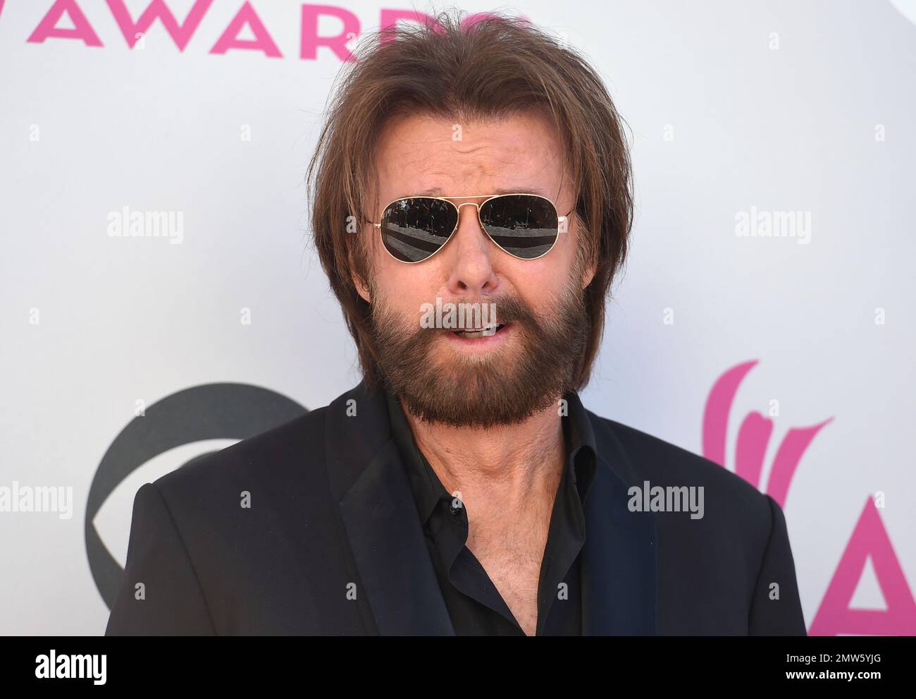 Ronnie Dunn, of Brooks & Dunn, arrives at the 52nd annual Academy of ...