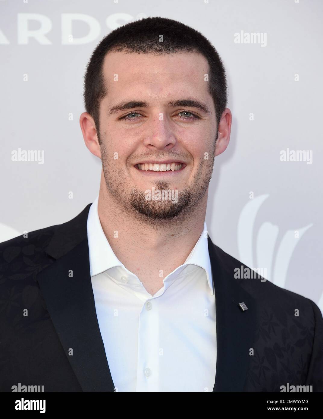 NFL player Derek Carr, of the Oakland Raiders arrives at the 52nd ...