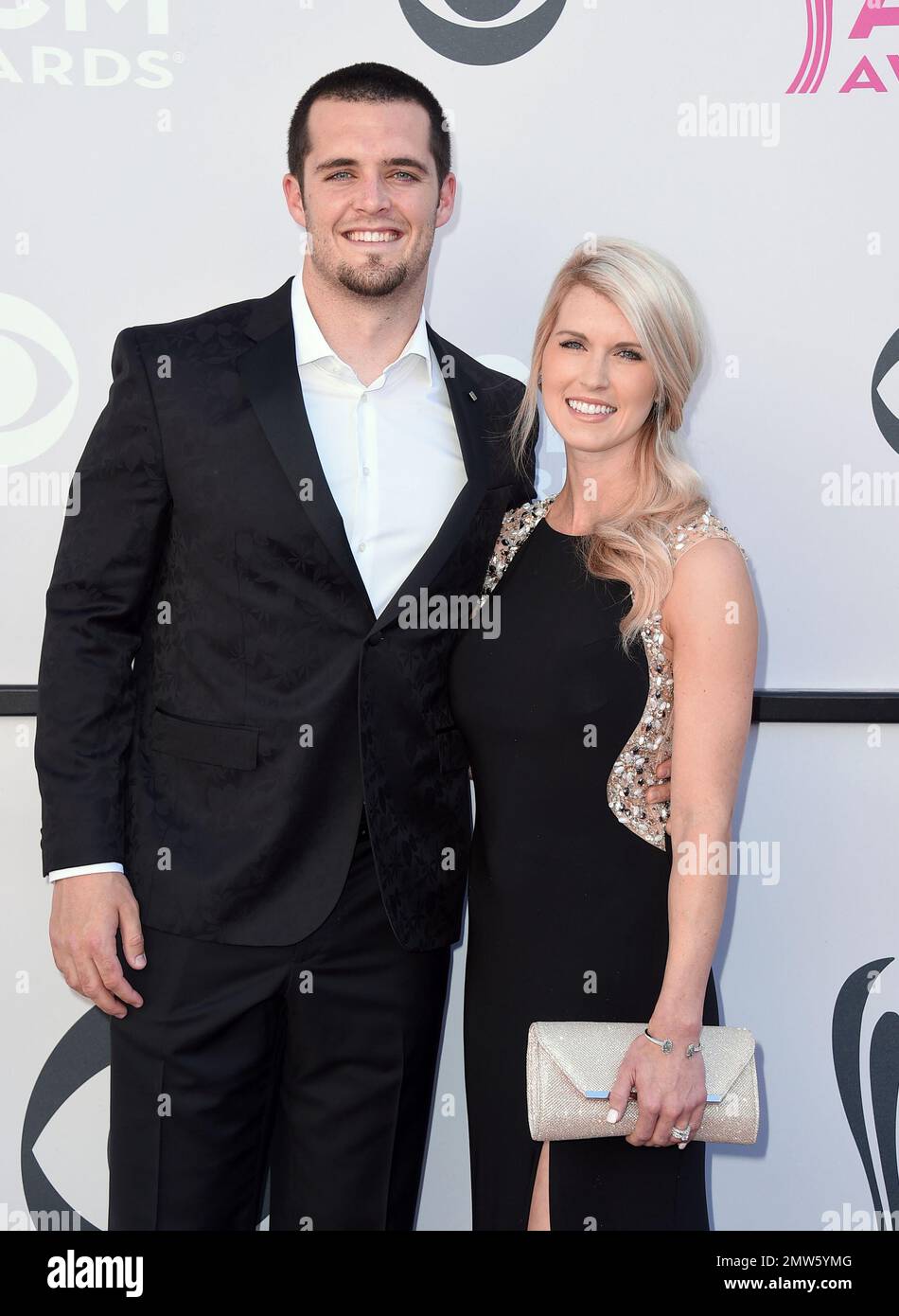 NFL player Derek Carr, of the Oakland Raiders, left, and Heather Neel ...