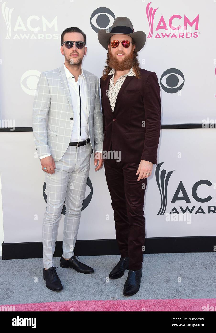 T.J. Osborne, left, and John Osborne, of Brothers Osborne, arrive at ...