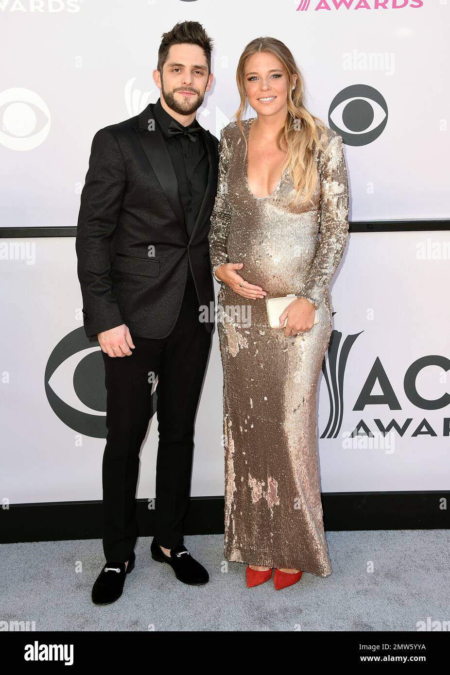 Thomas Rhett, left, and Lauren Gregory arrive at the 52nd annual ...