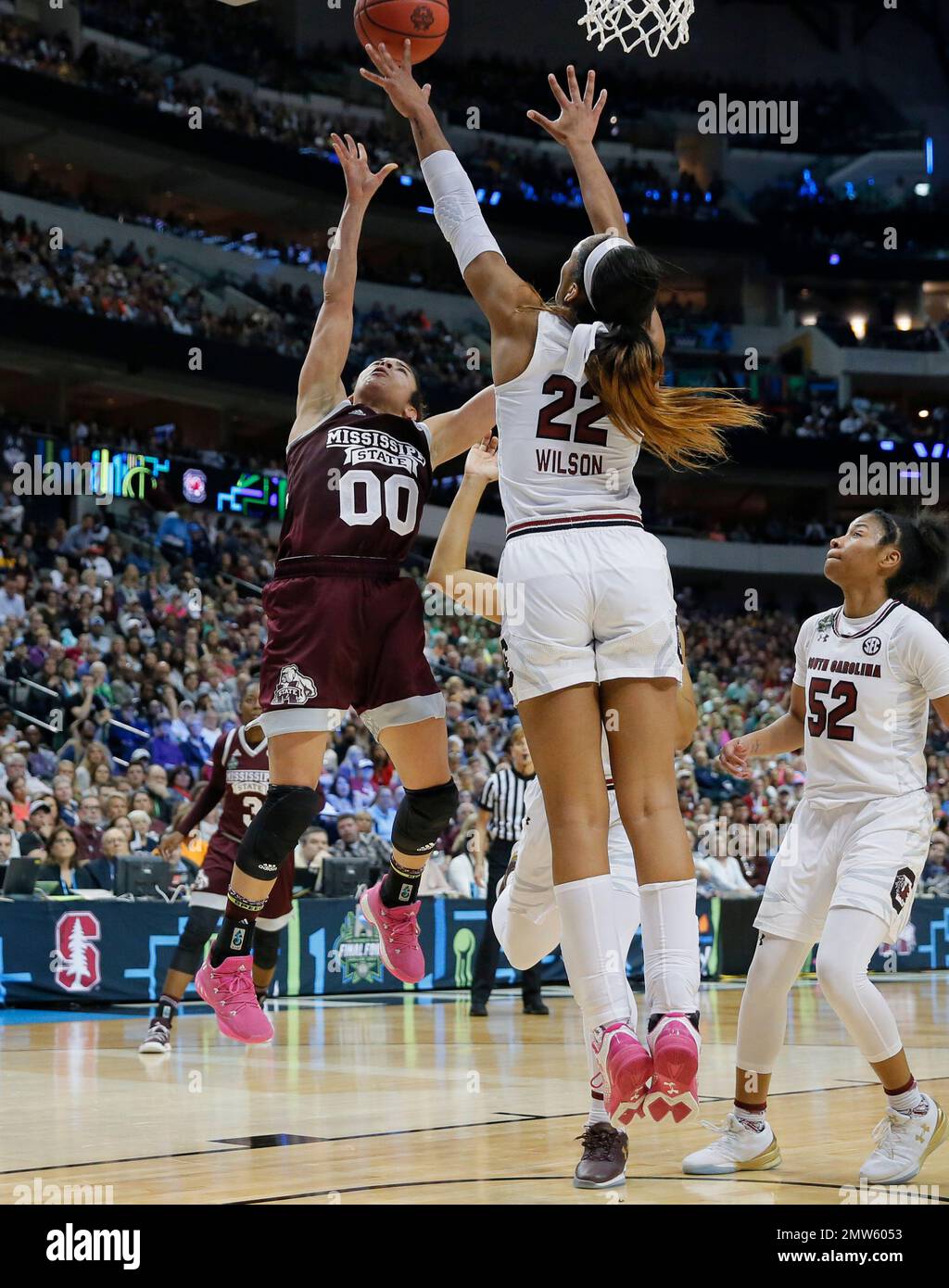 Mississippi State guard Dominique Dillingham (00) has her shot blocked ...