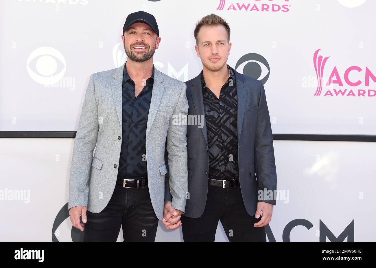 Cody Alan, left, and Michael Trea Smith arrive at the 52nd annual ...