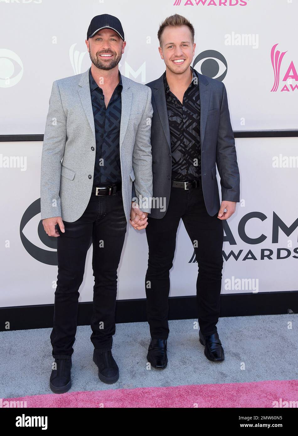 Cody Alan, left, and Michael Trea Smith arrive at the 52nd annual ...