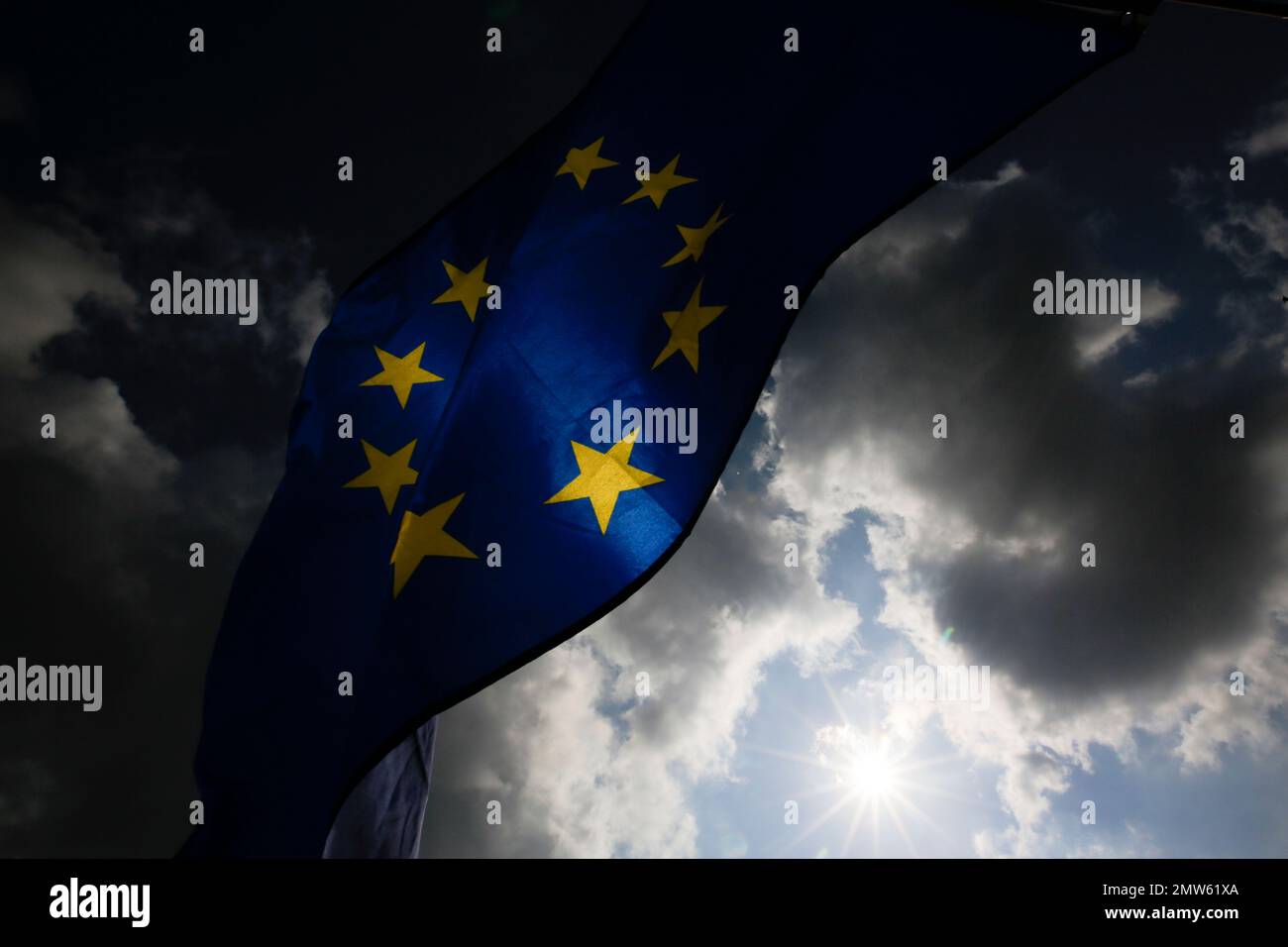 A supporters waves a European flag during a rally of the Pulse of ...