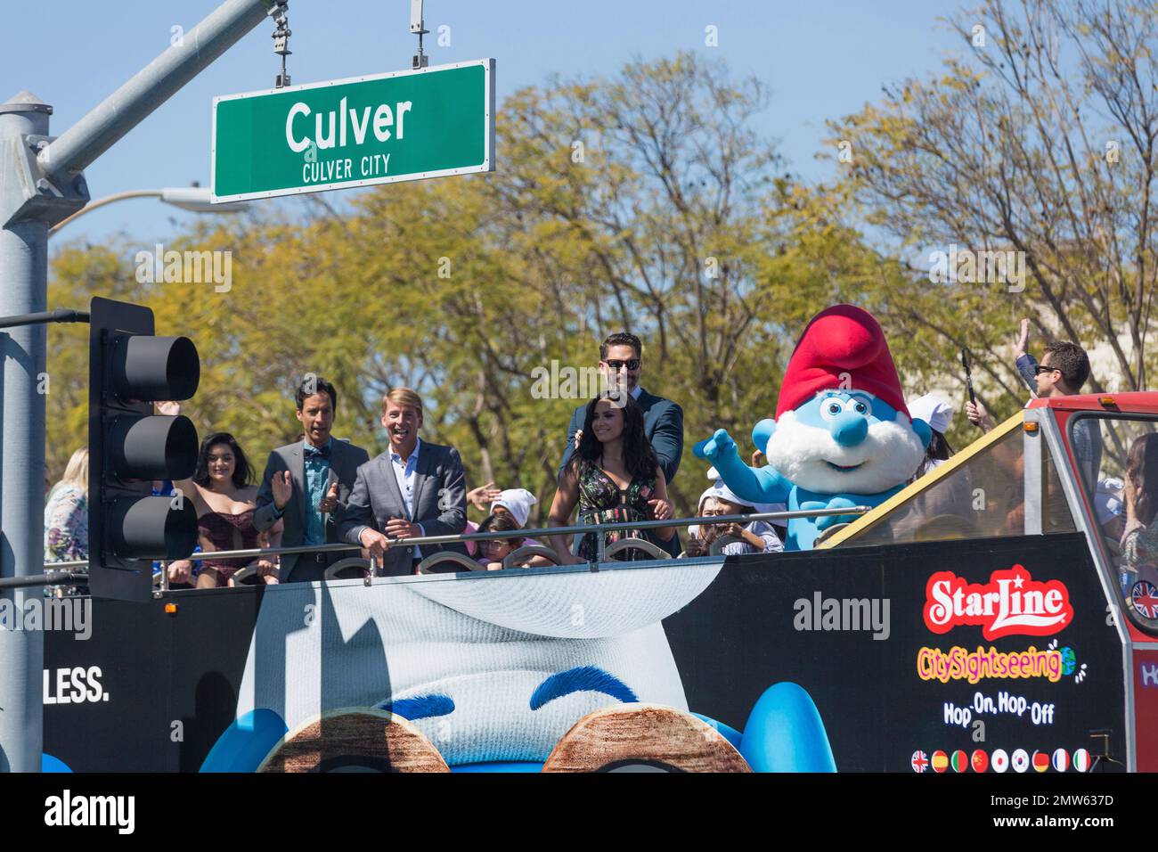 The cast of the movie arrive by bus at the World Premiere of "Smurfs ...