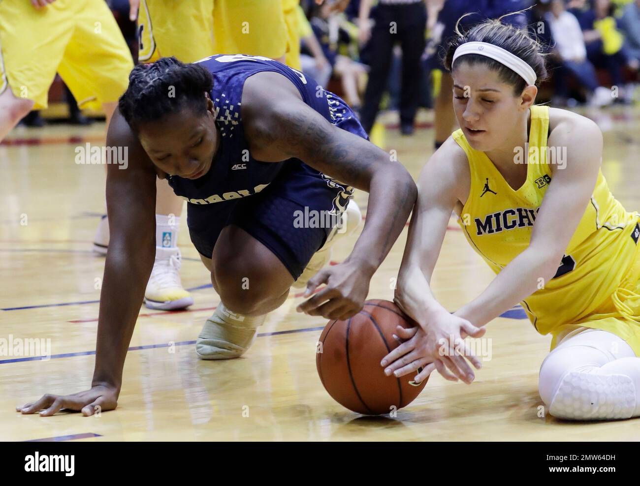 Georgia Tech forward Zaire O'Neil, left, and Michigan guard Katelynn ...