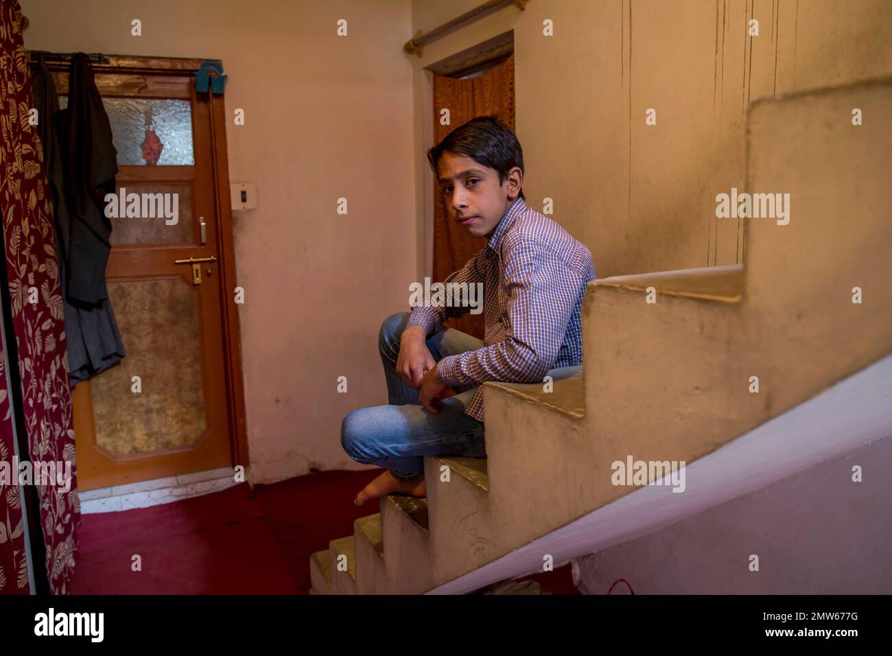 In this March 30, 2017 photo, Mir Mehran, 11, a Kashmiri boy who was ...