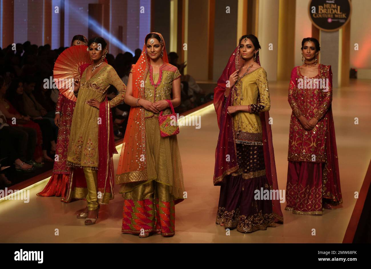 Pakistani models present creations of designer Yasmin Zaman during the ...