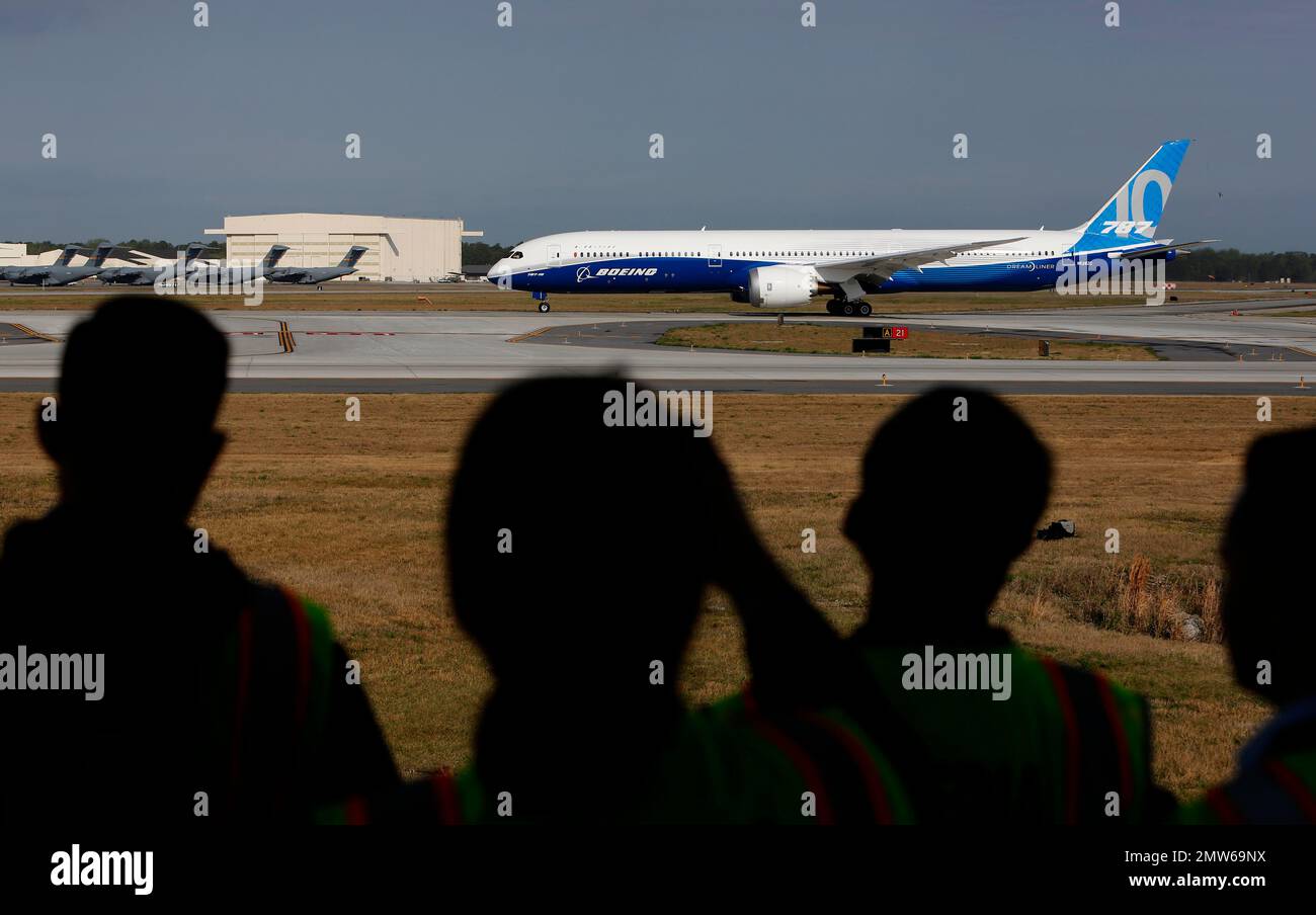 Members of the aviation media watch the first test flight of the new ...