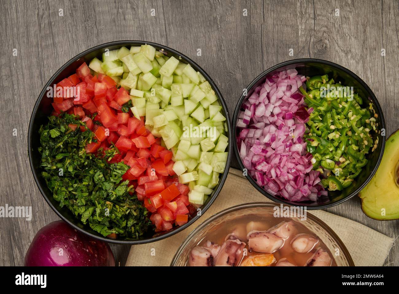 Tomato, cucumber and cilantro chopped in small squares to prepare ...