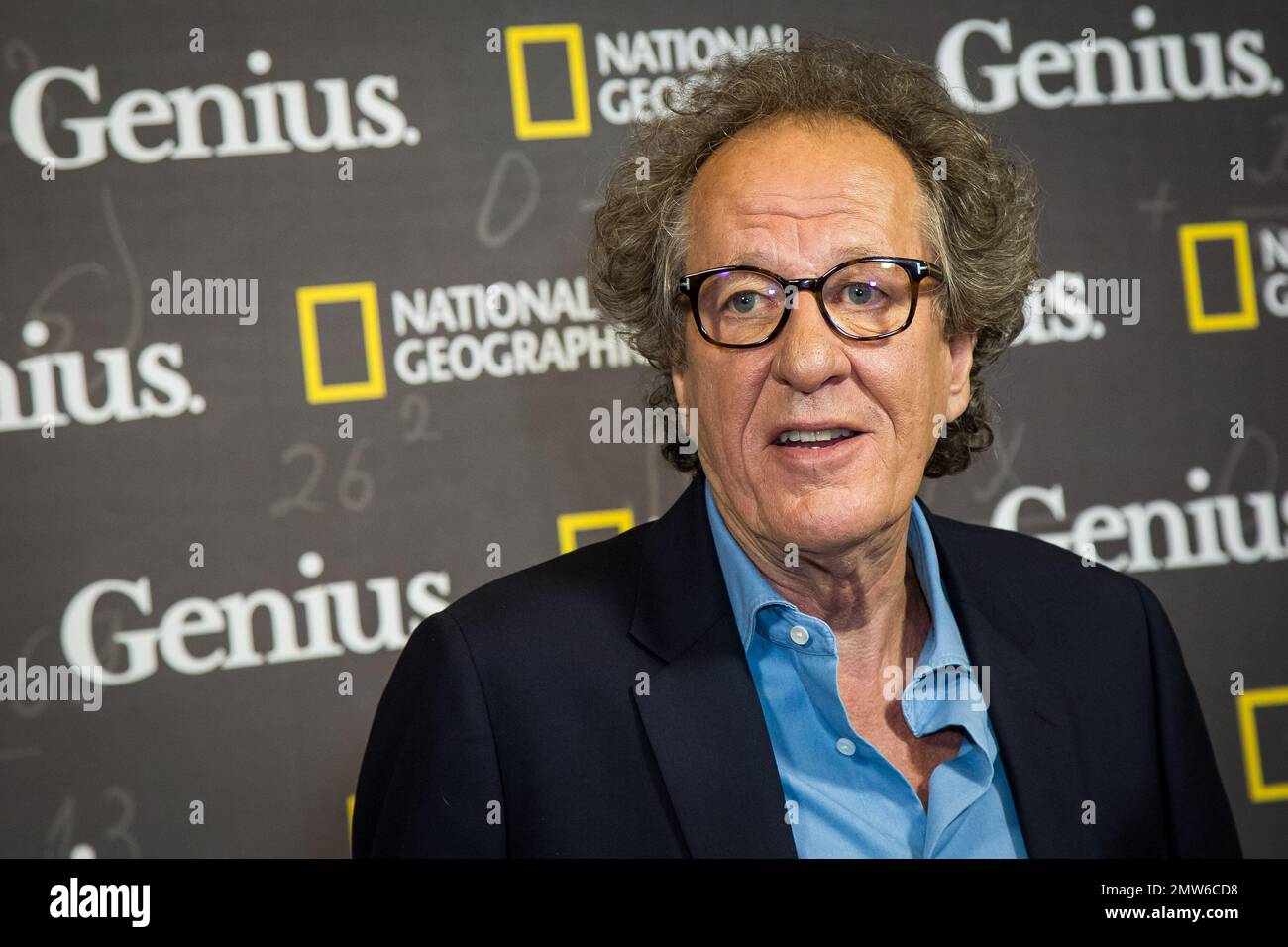 Actor Geoffrey Rush poses for photographers upon arrival at the ...