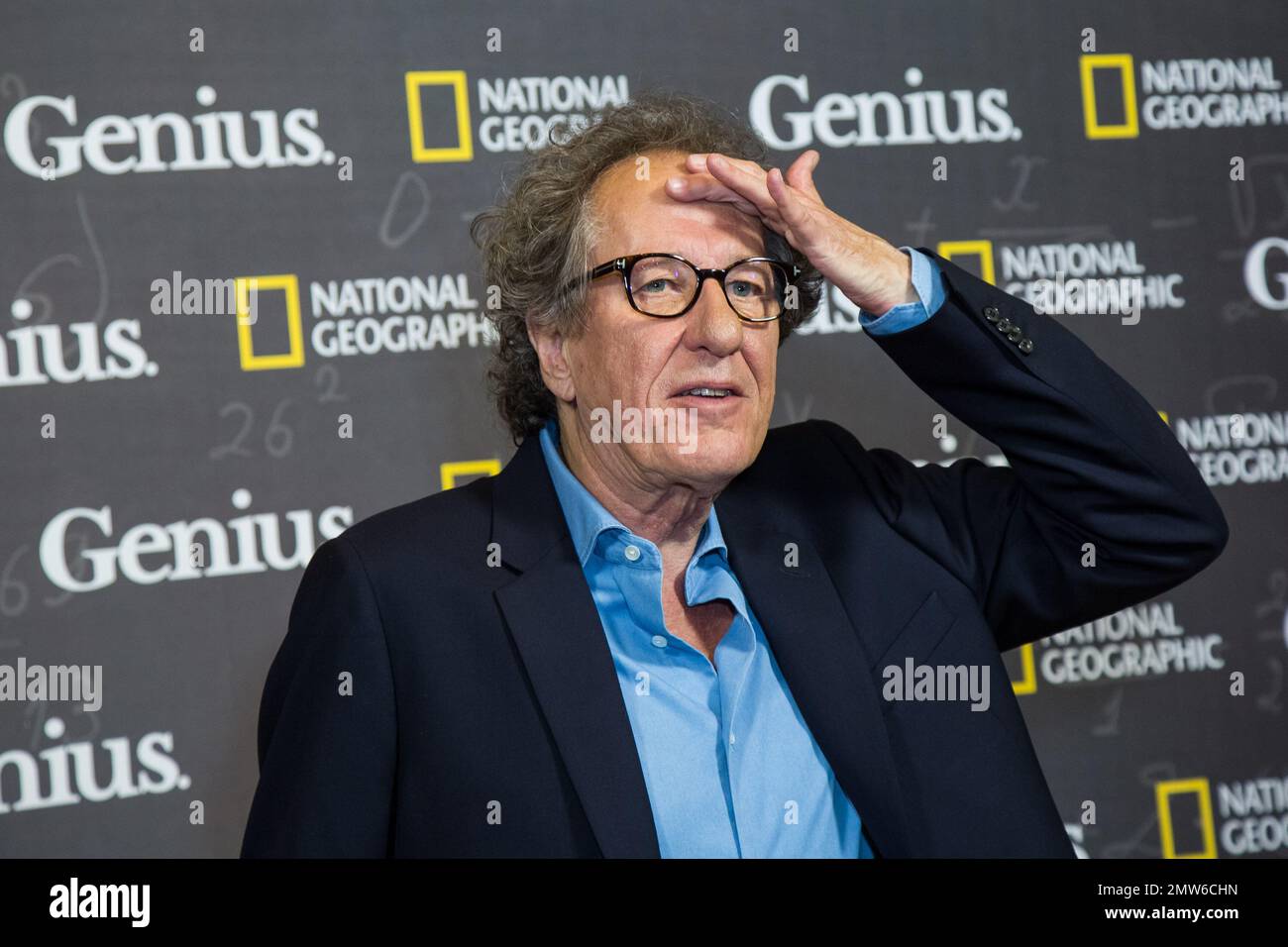 Geoffrey Rush poses for photographers upon arrival at the premiere of ...