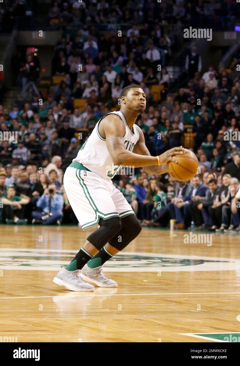 Boston Celtics guard Marcus Smart (36) sets to shoot a three-point shot ...