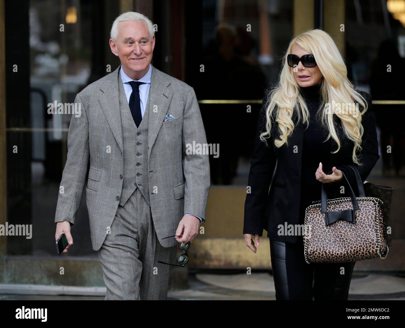 Roger Stone and Kristin Davis leave court in New York, Thursday, March ...